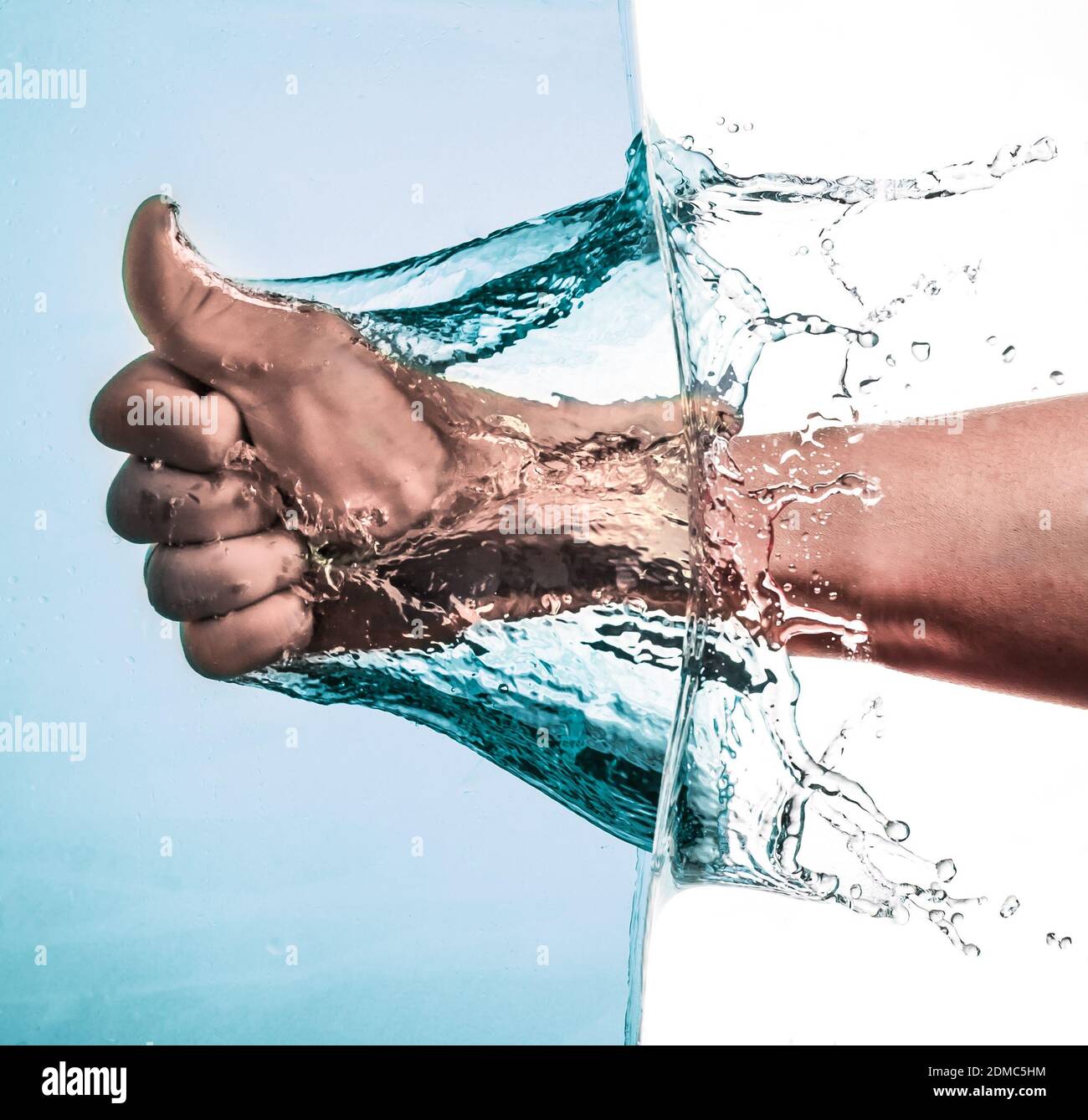 Hand punch through water hi-res stock photography and images - Alamy