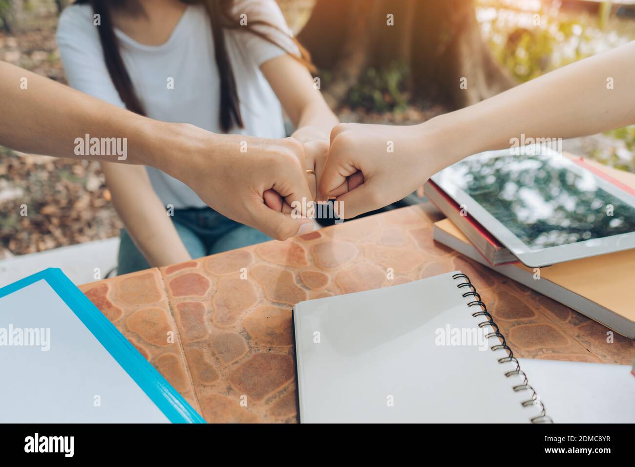 Fist bump classroom hi-res stock photography and images - Alamy