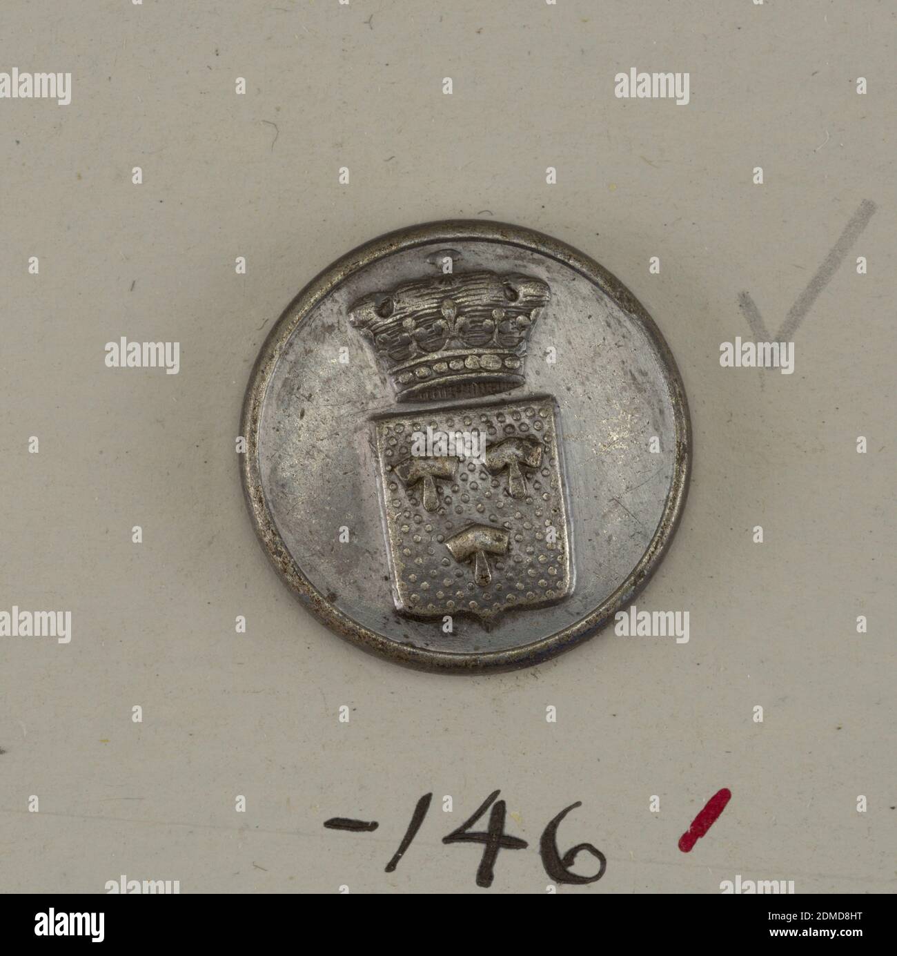 Button, Silver, Flat button with ornament showing a shield with ...