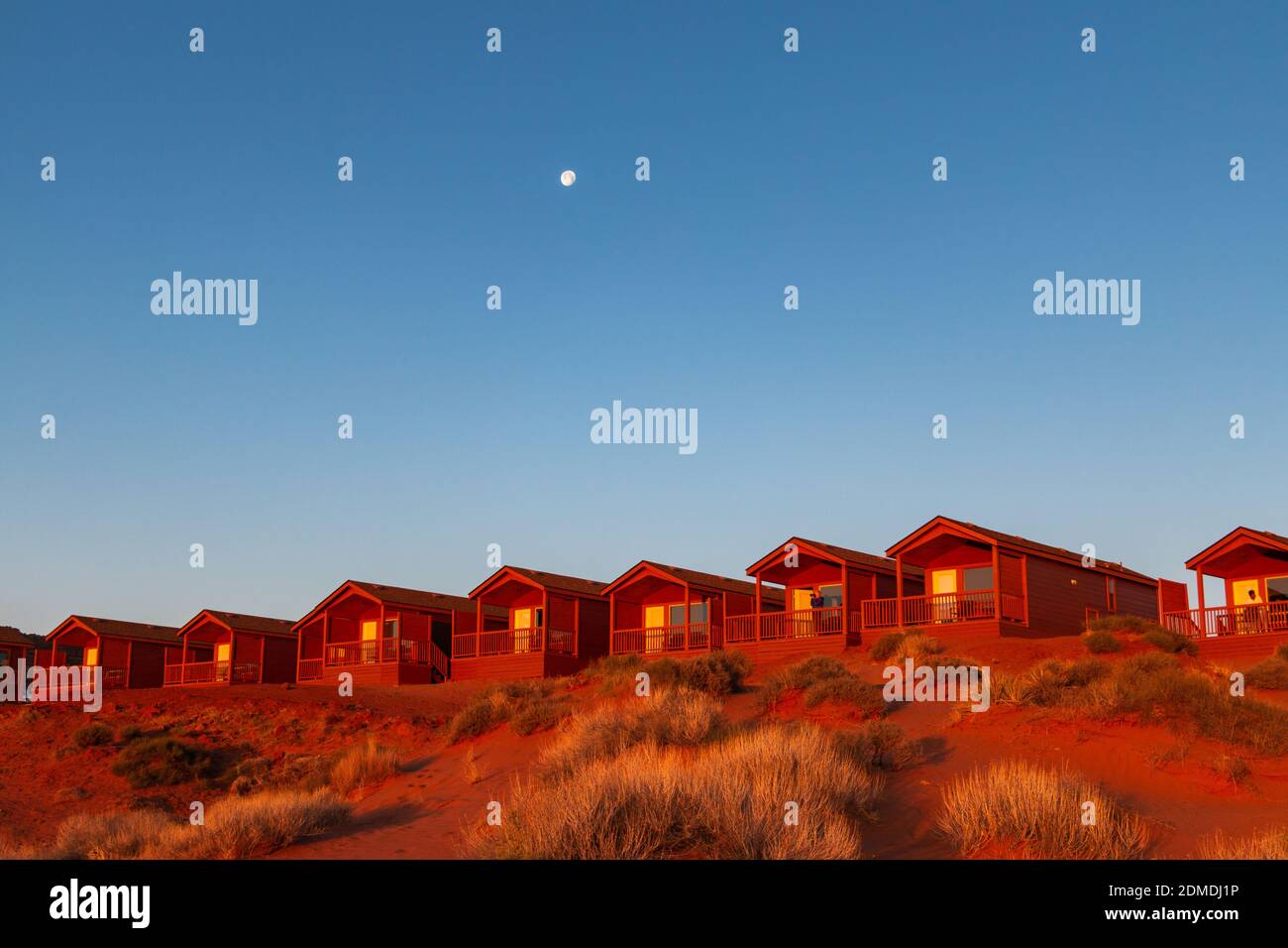 Lined up scenic cabins at sunrise in Monument Valley Stock Photo - Alamy