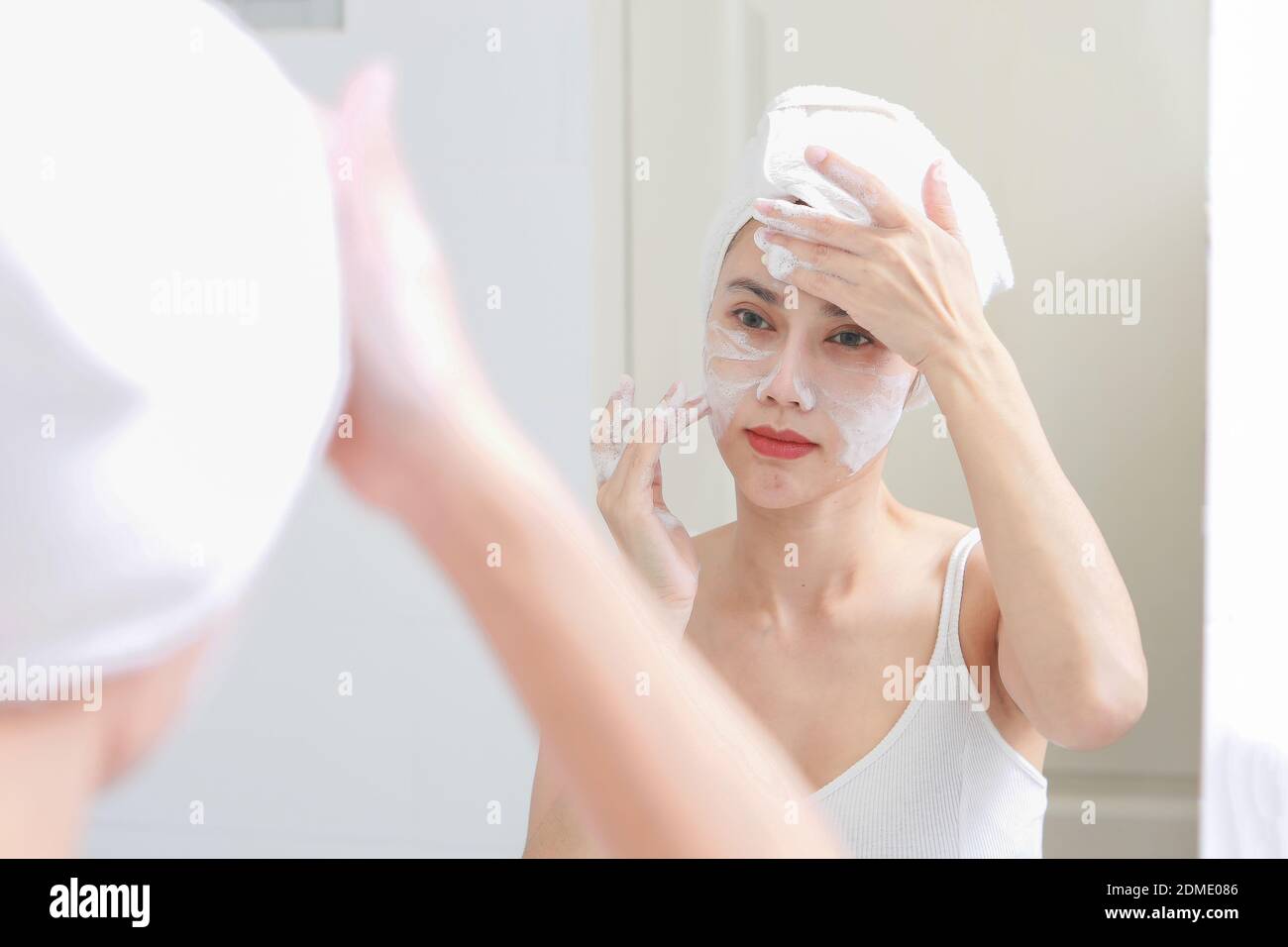 Young woman washing herself body hi-res stock photography and images ...