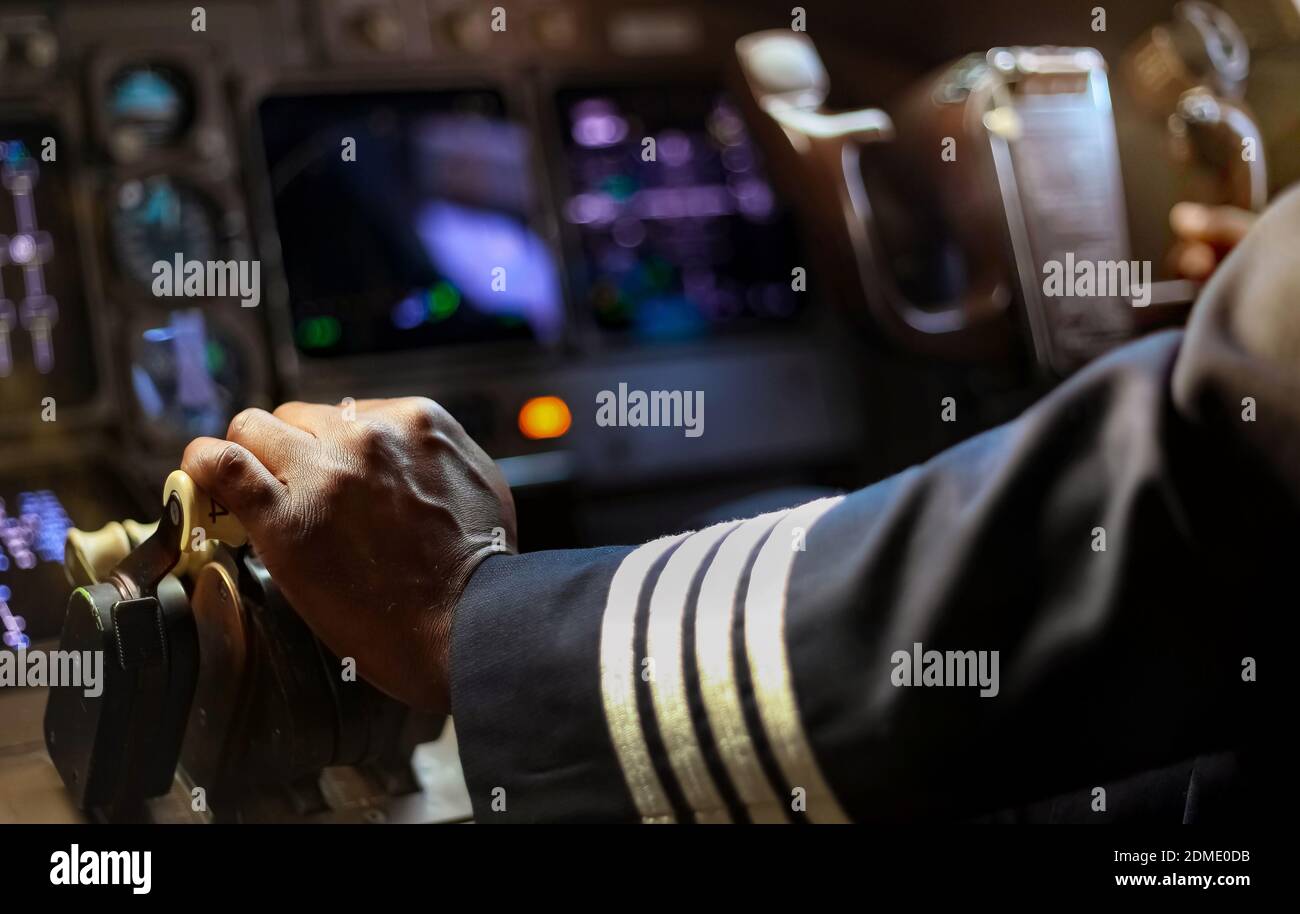 A closeup shot of a pilot's hands controlling the airplane Stock Photo ...