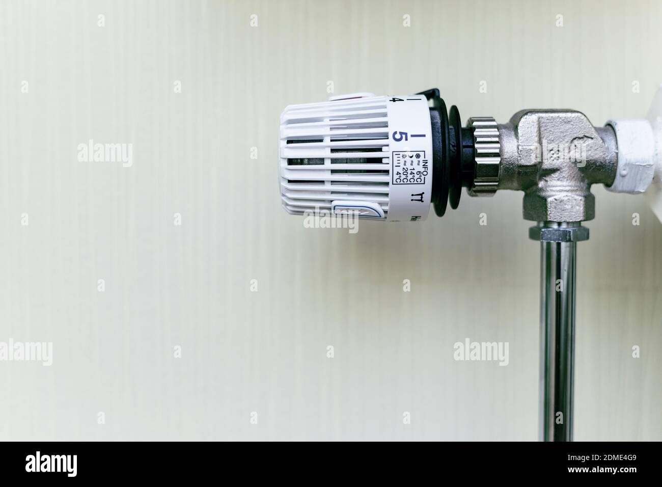 thermostatic valve on radiator close up Stock Photo - Alamy