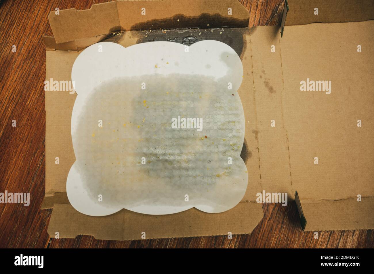 single use cardboard that is nonrecyclable because of the food residue ...