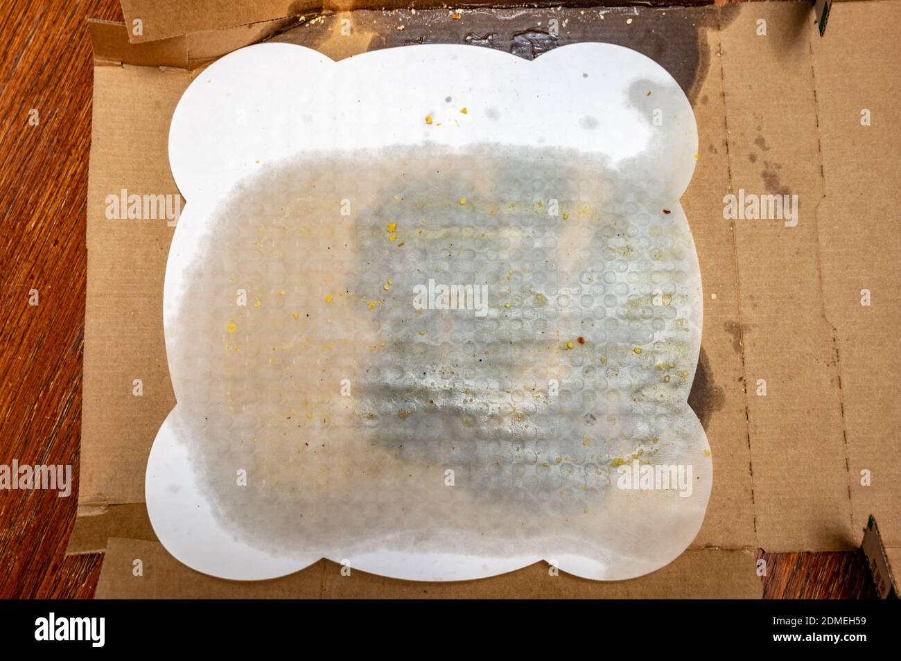 single use cardboard that is nonrecyclable because of the food residue ...