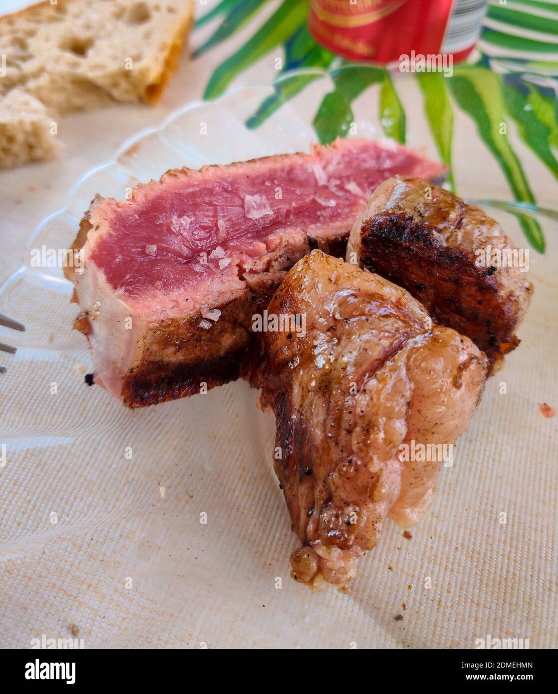 A vertical shot of a steak cooked at rare level Stock Photo - Alamy
