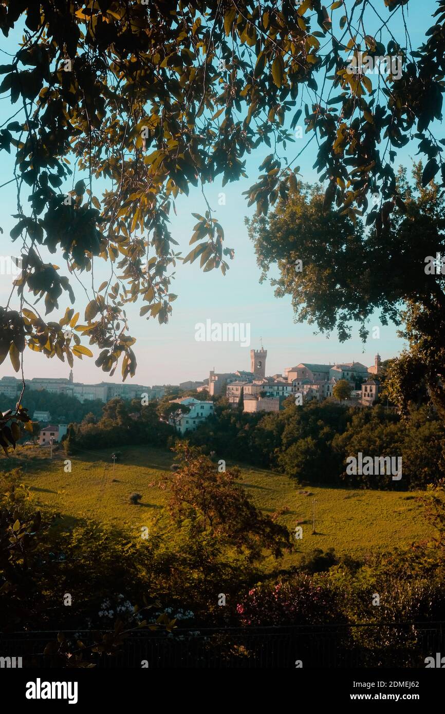 A beautiful view of a town with fortress castles through the tree ...