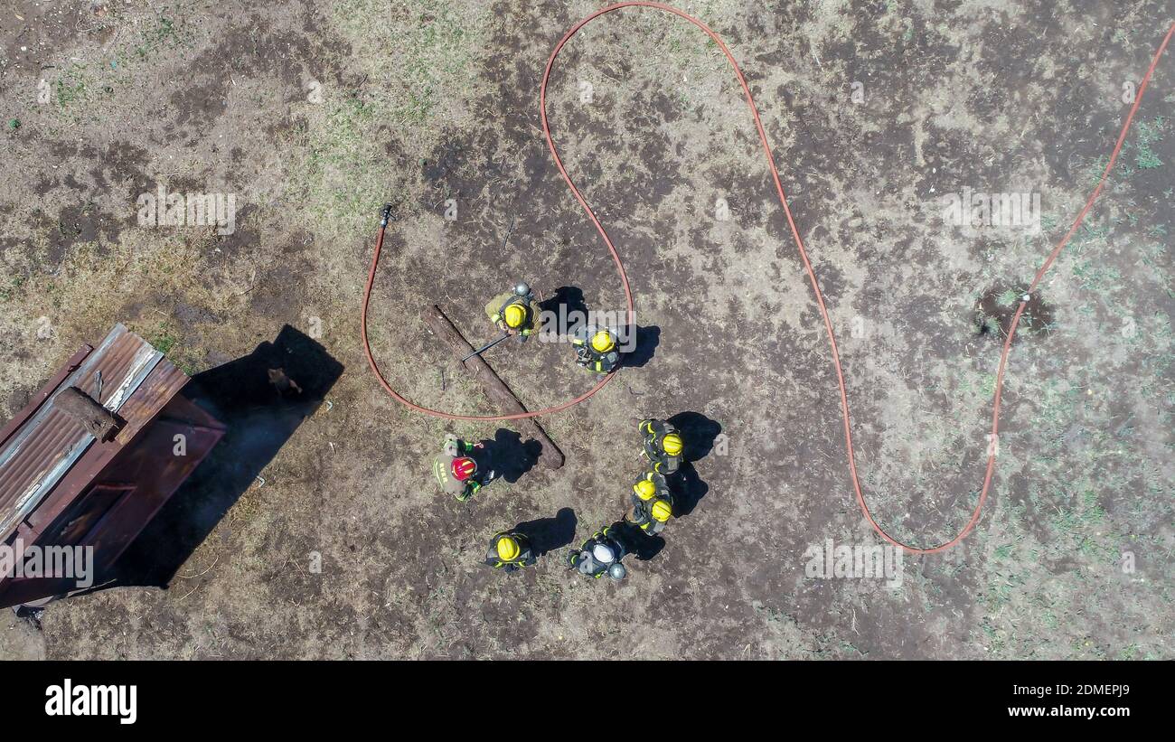 An aerial top view of firefighters meeting in Stock Photo - Alamy