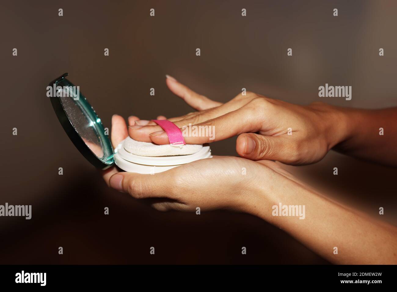 Hand holding mirror compact hi-res stock photography and images - Alamy