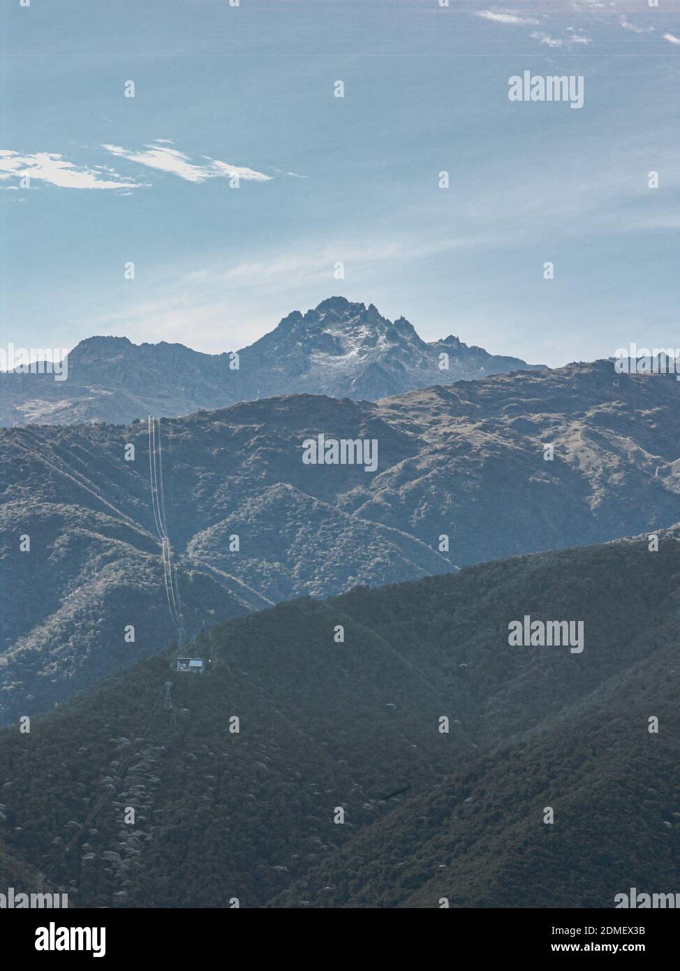 A vertical shot of mountain ranges covered Stock Photo - Alamy