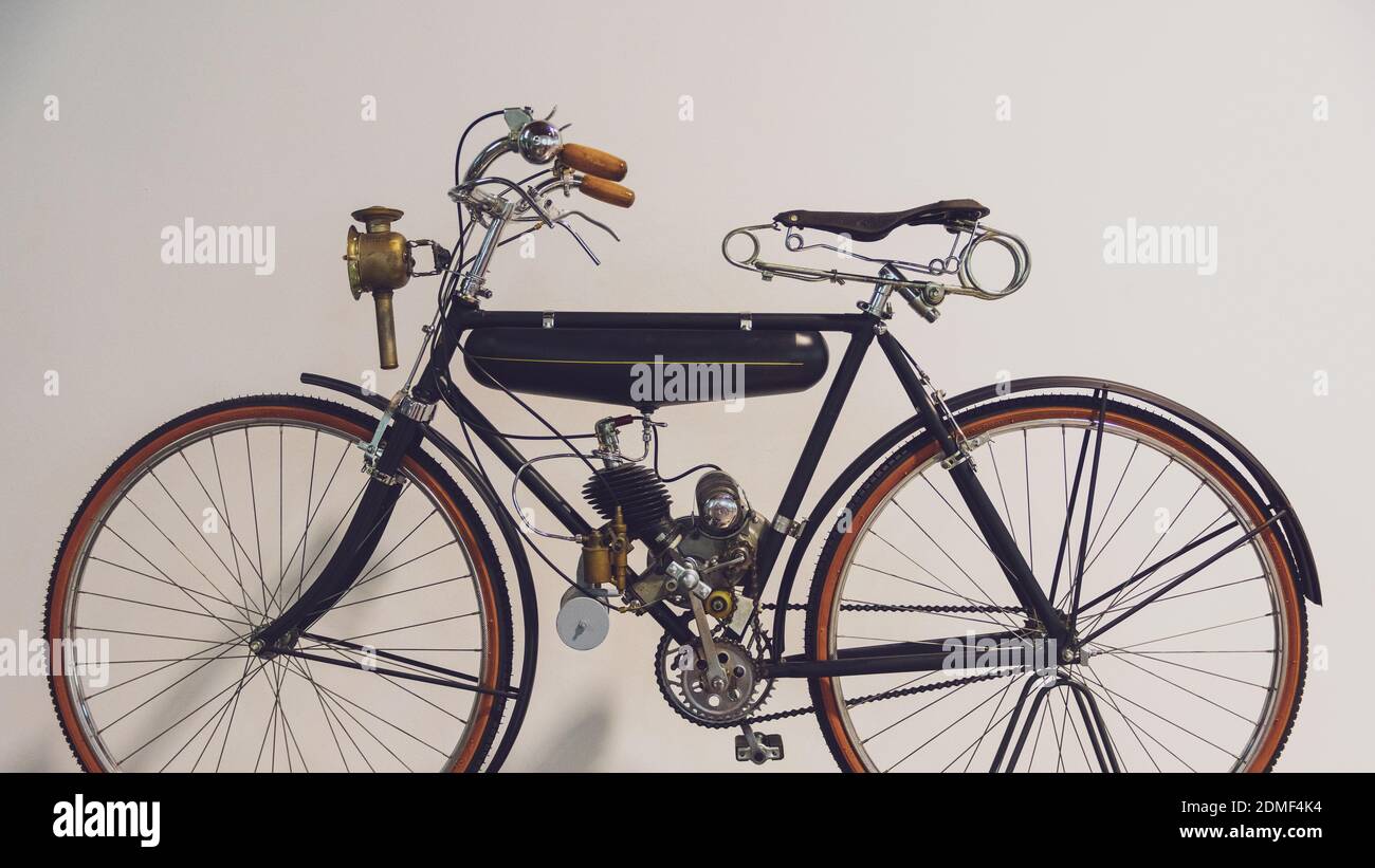 A closeup of a vintage bicycle isolated on a beige background Stock ...