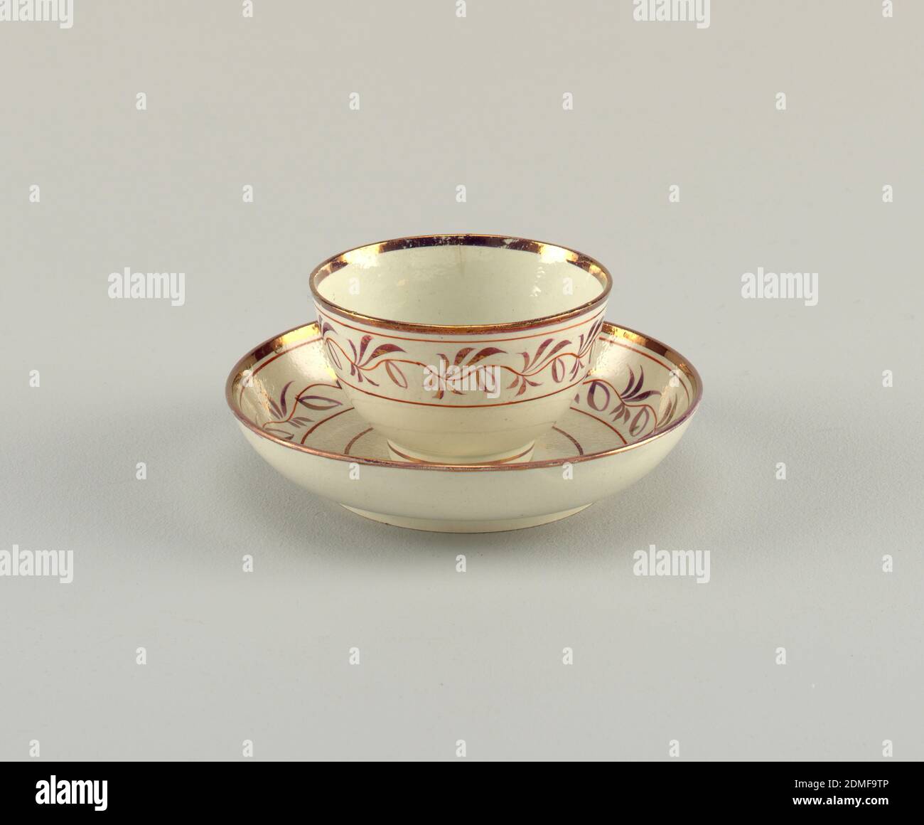 Cup and saucer, Tin-glazed earthenware with overglaze lustre and ...