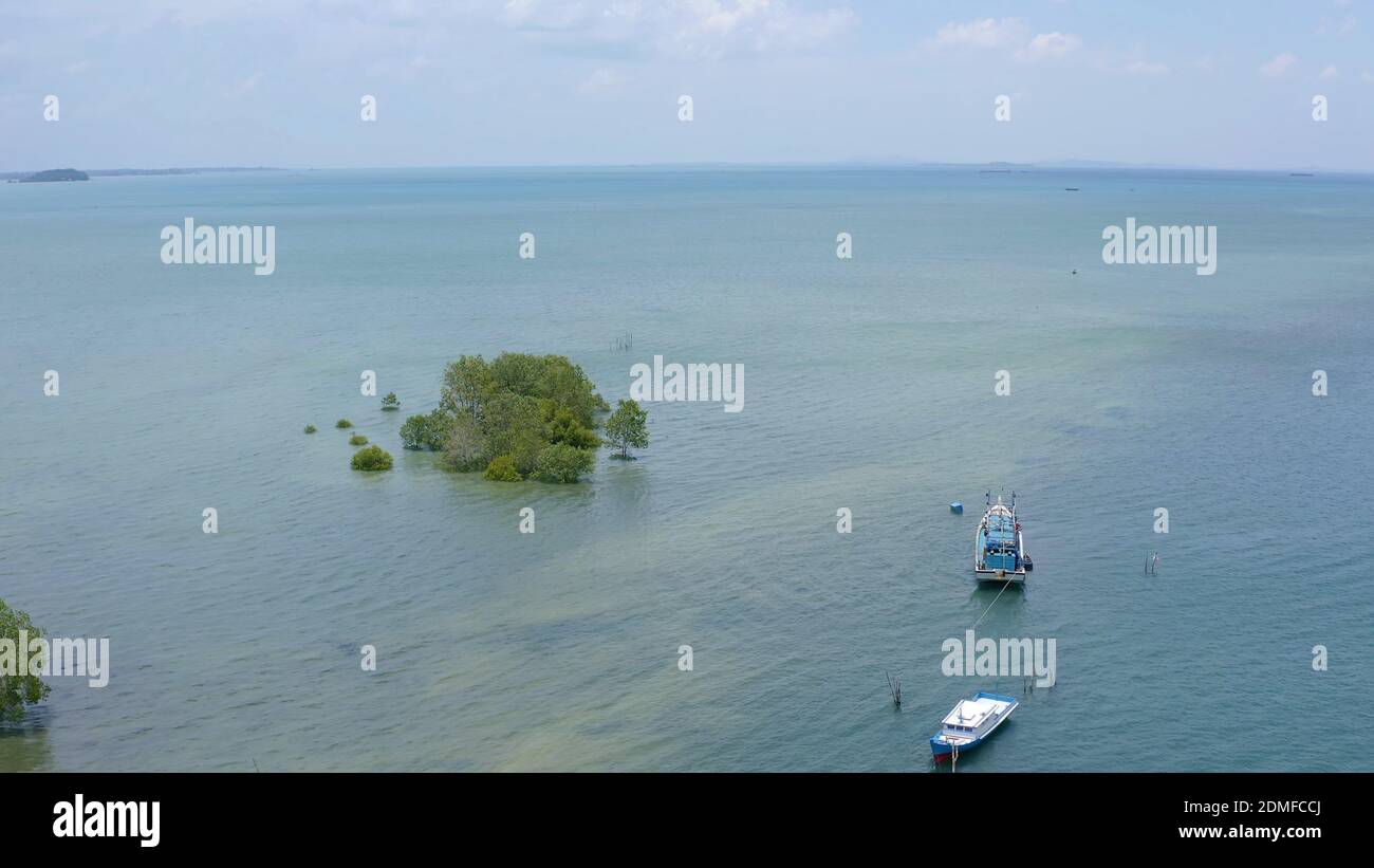 A high angle shot of a wonderful sea with floating boats Stock Photo ...