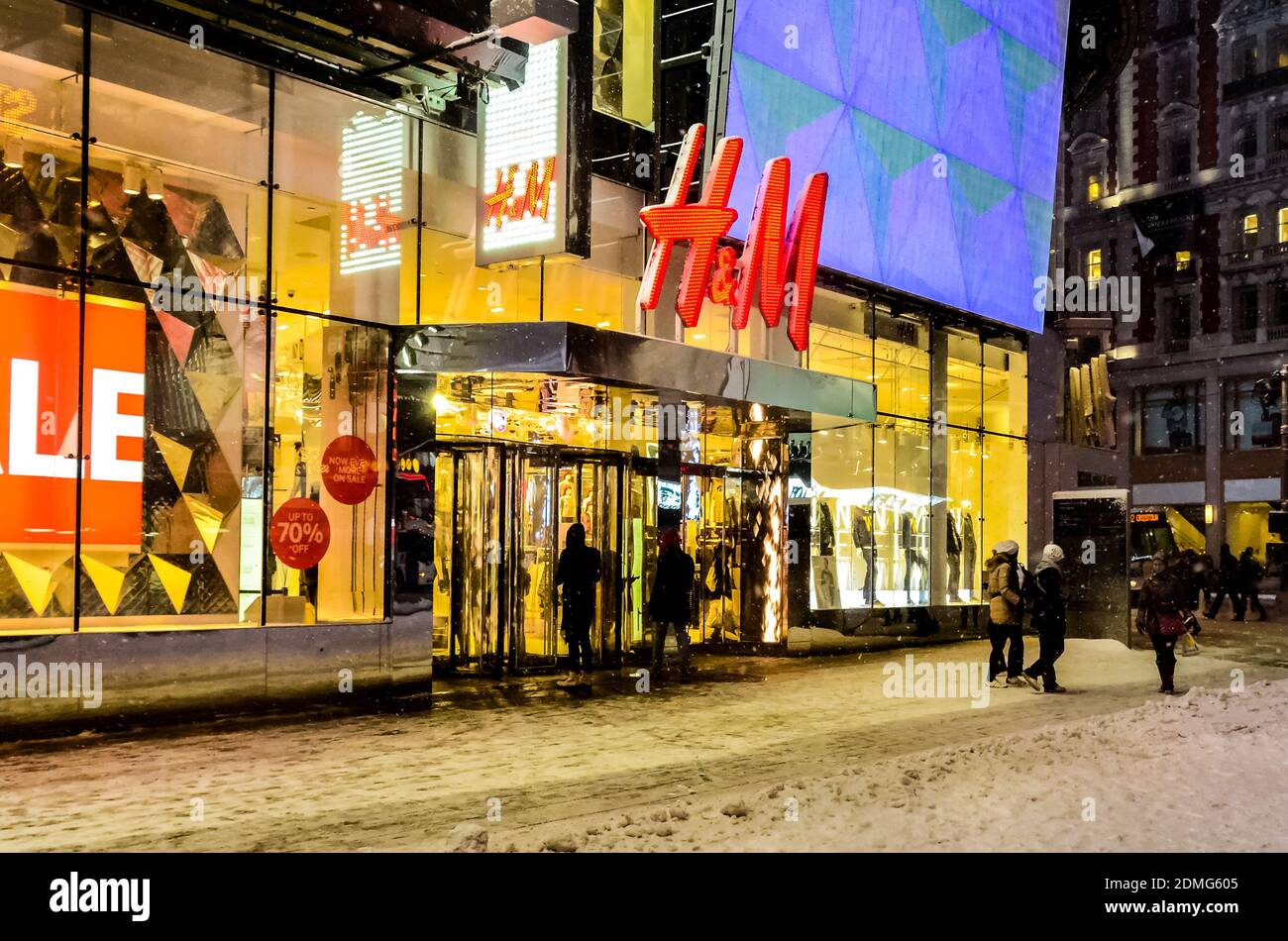 H&M store in Times Square during a snowstorm blizzard in New York City ...