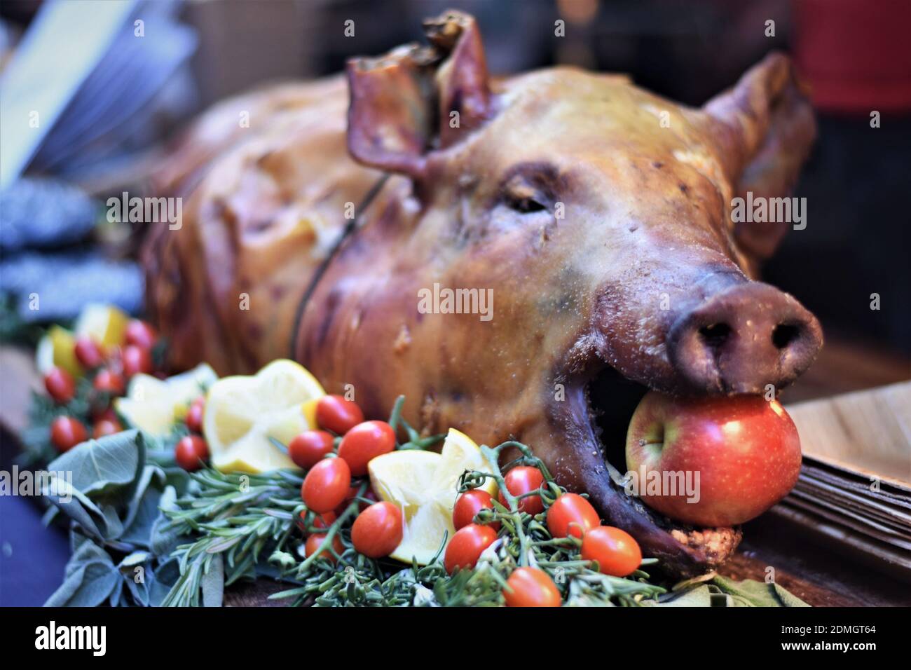 People eating pig roast hi-res stock photography and images - Alamy