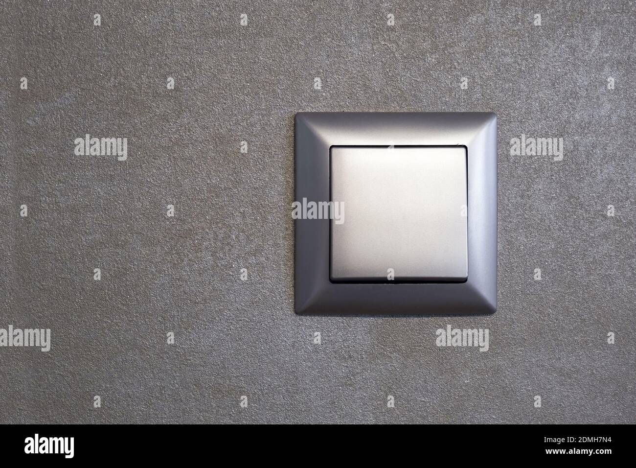 Light switch on wall grey hi-res stock photography and images - Alamy