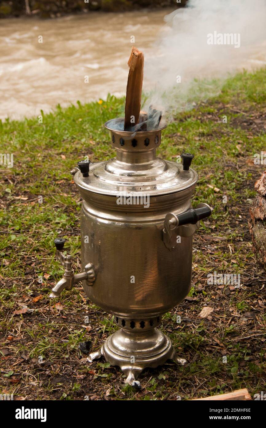 Samovar on wood. In the samovar, water is heated for tea. Russian ...