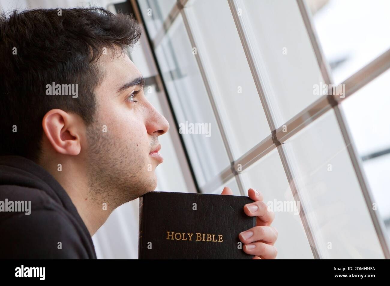 Looking at bible hi-res stock photography and images - Alamy