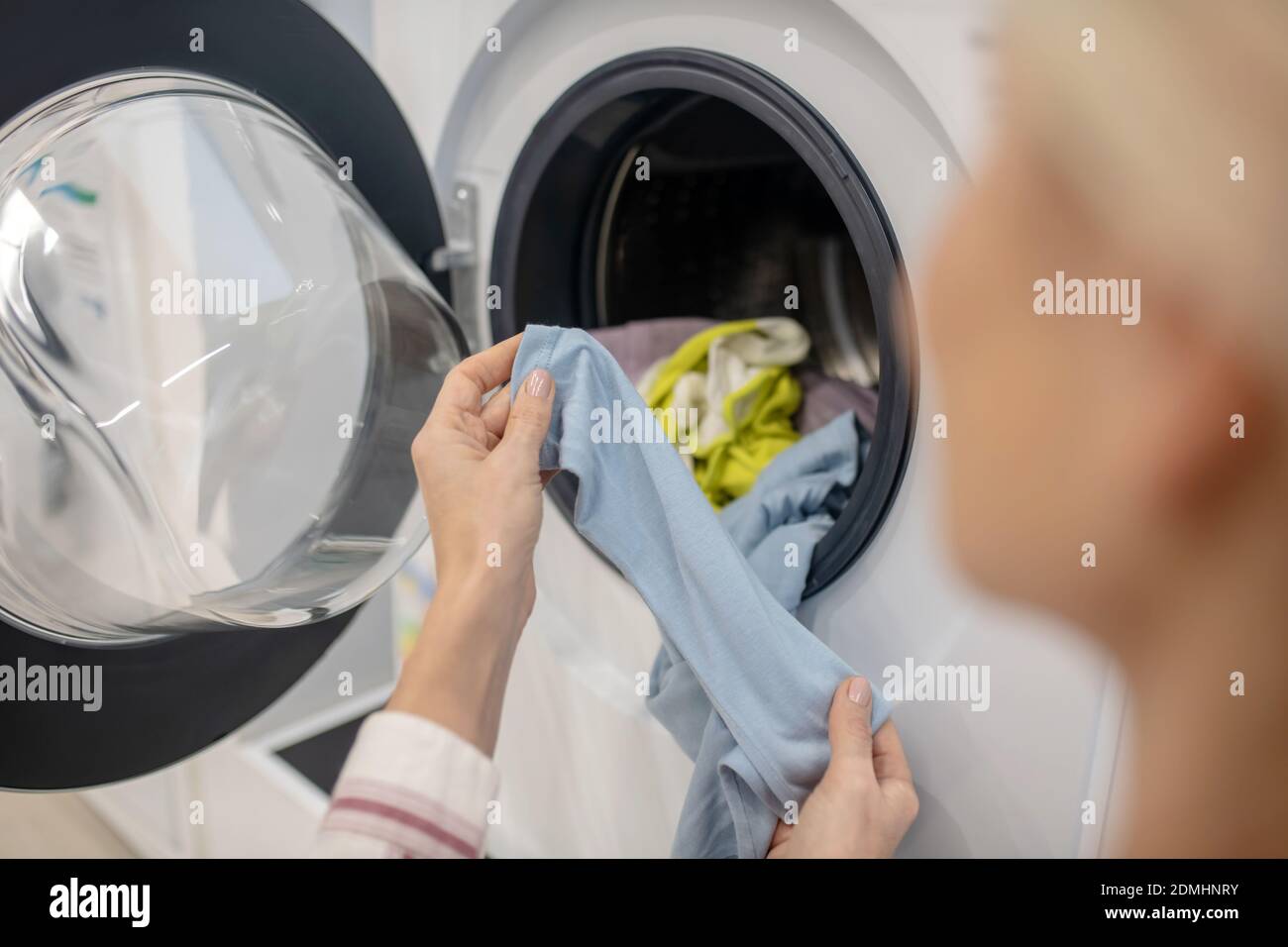 Washing machine clothes hi-res stock photography and images - Alamy