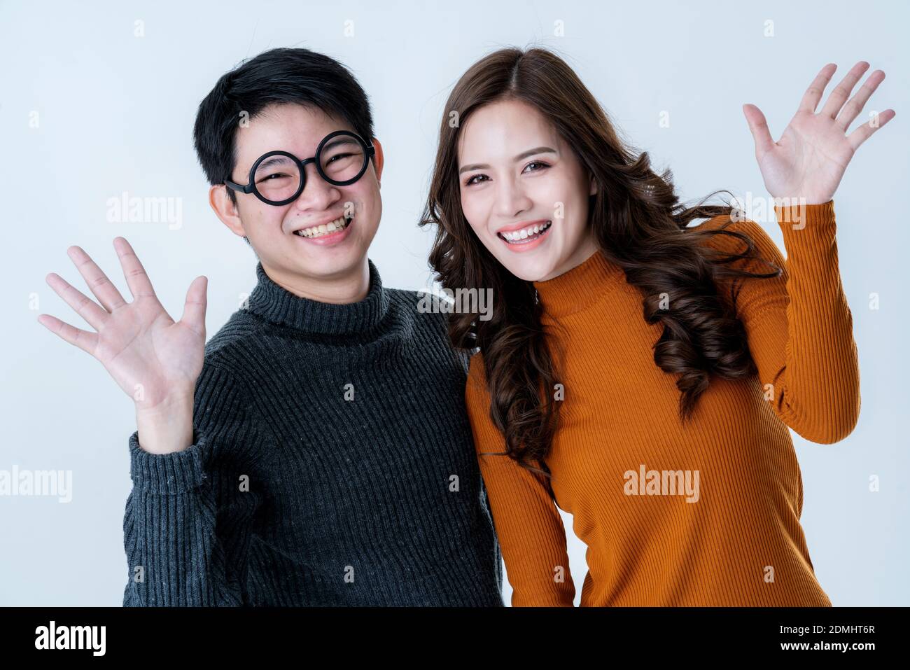 Two Men Waving Hands High Resolution Stock Photography and Images - Alamy