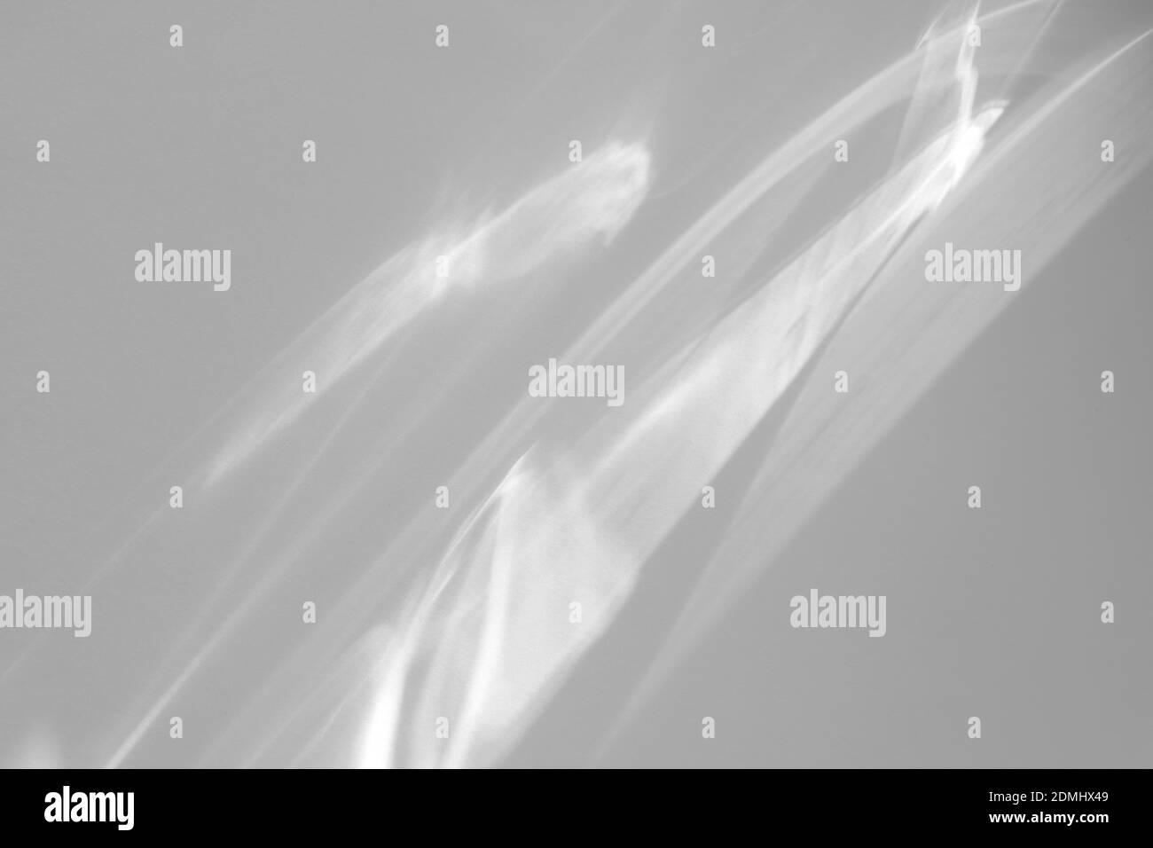 shadow and light caustic effect on a white wall Stock Photo - Alamy