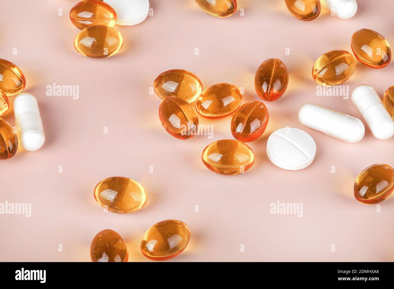 Variety of vitamin pills on beige background, supplemental and ...