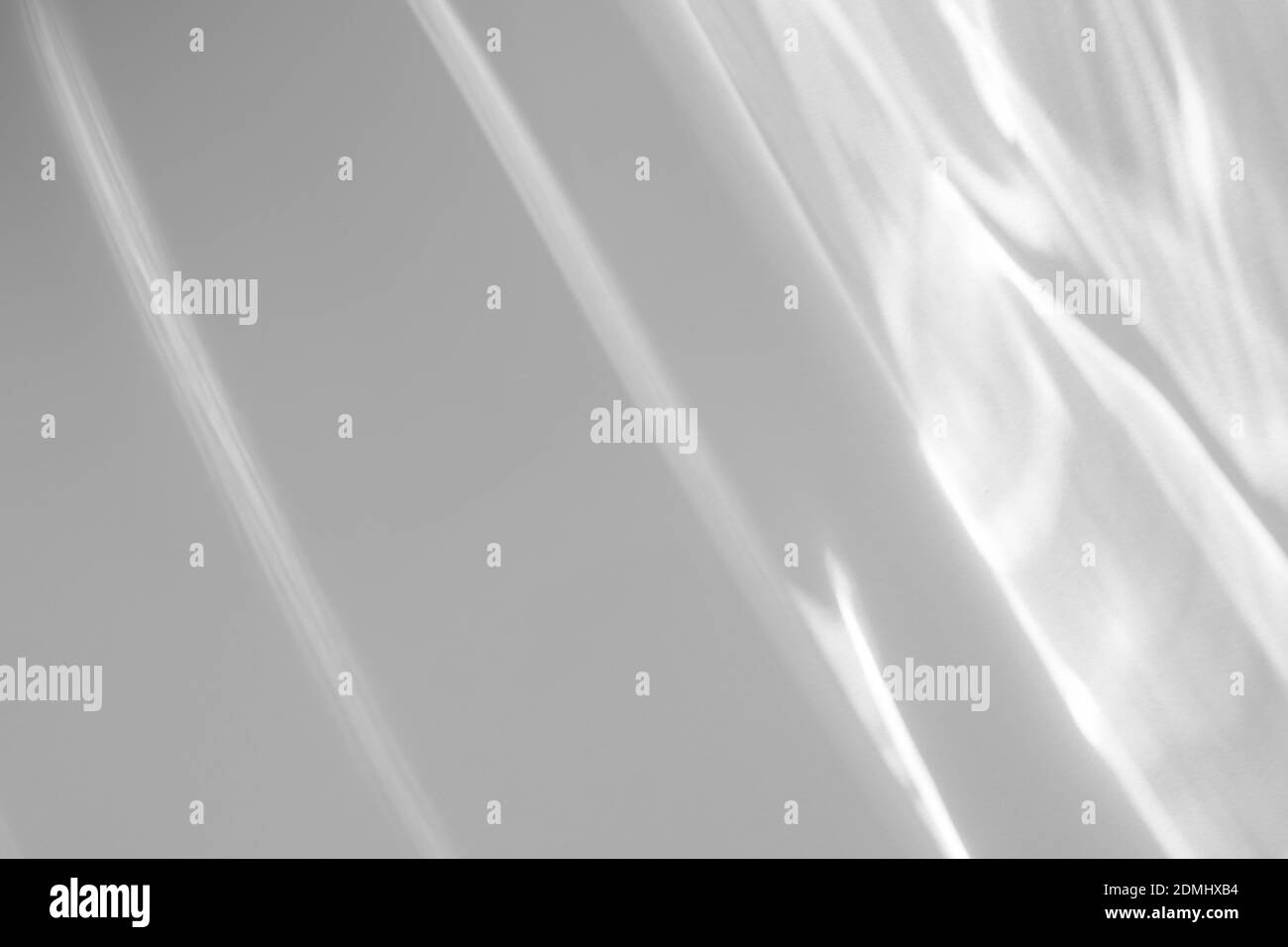 shadow and light caustic effect on a white wall Stock Photo - Alamy