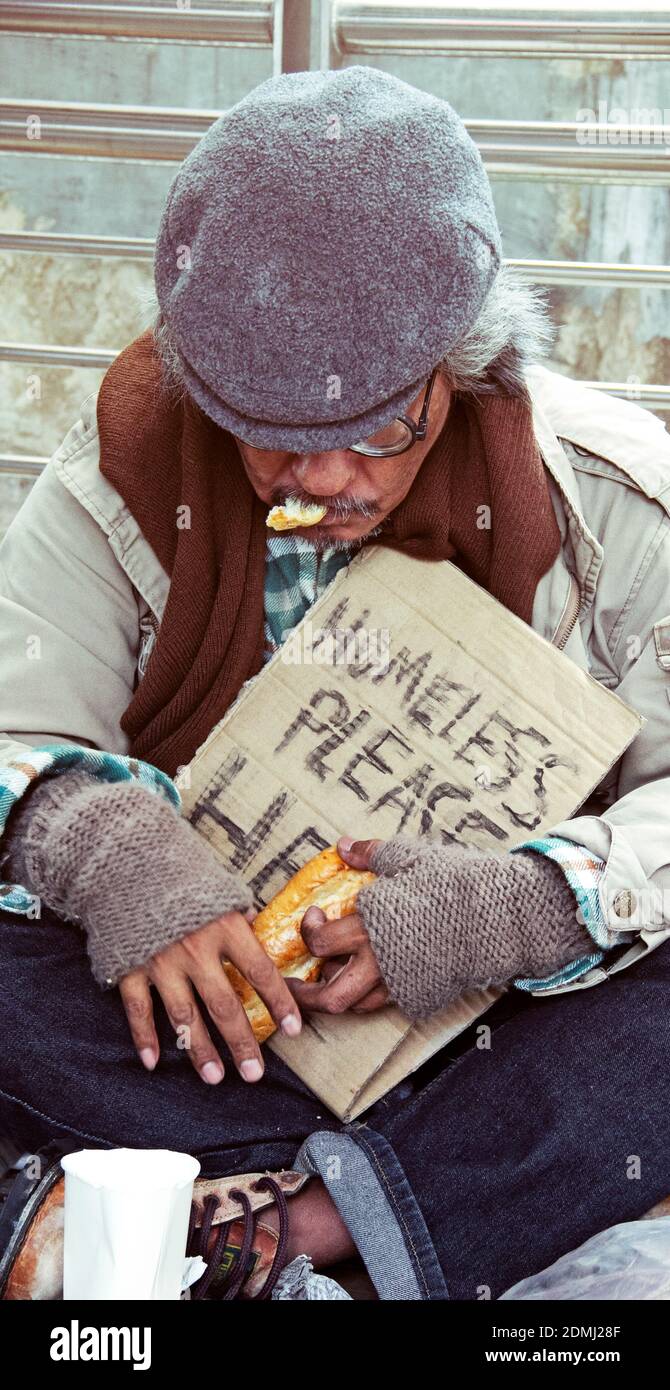 Homeless Man Eating High Resolution Stock Photography and Images - Alamy