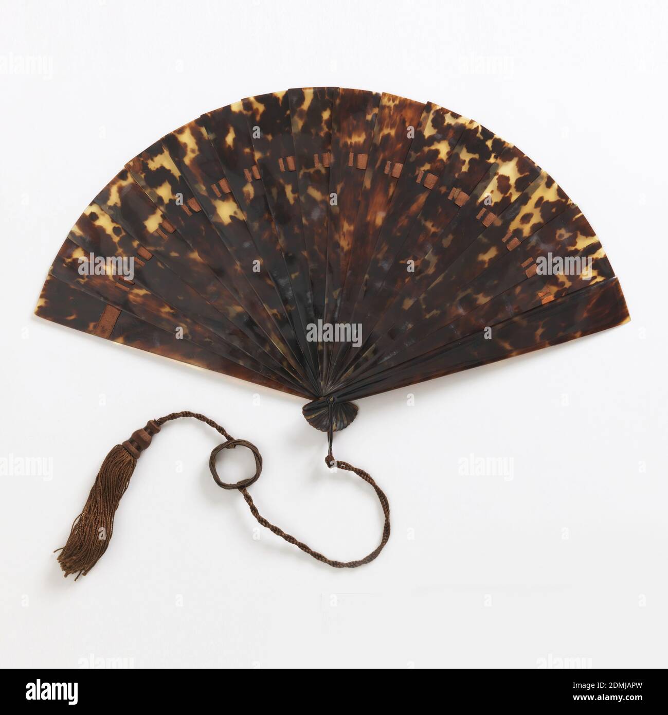 Brisé fan, Tortoise shell sticks, silk ribbon and tassel, metal bail ...
