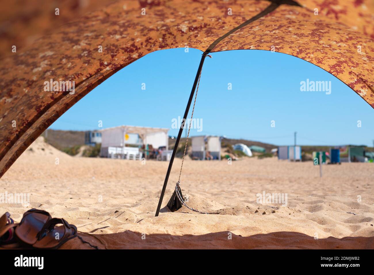 Rest at the sea in a tent. View from the tent to the camping. Summer ...