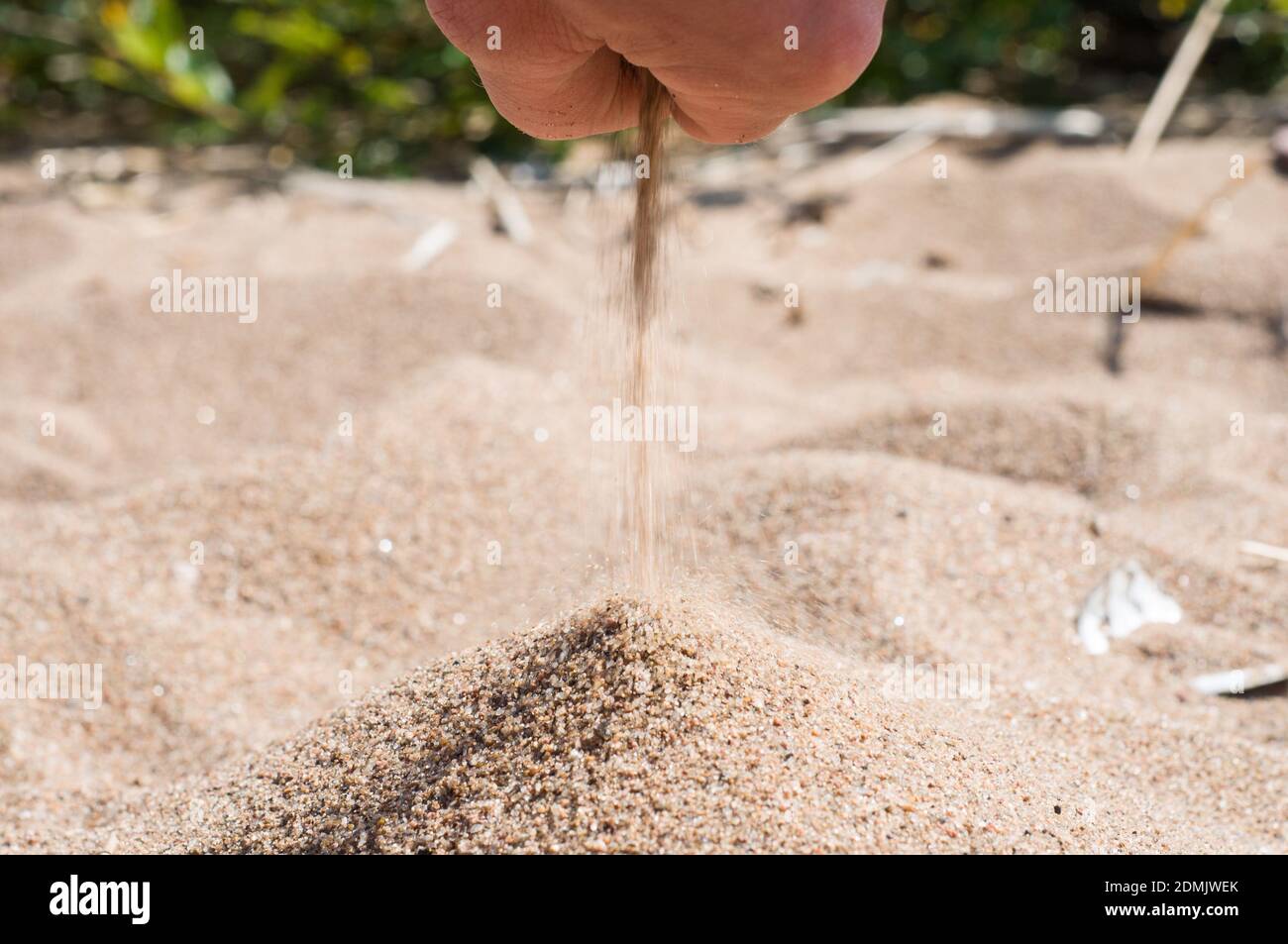 Hand Pouring Sand High Resolution Stock Photography and Images - Alamy