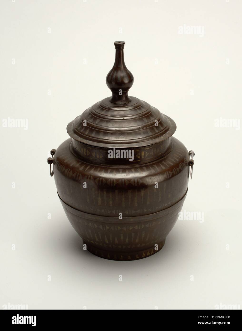 Jar and lid, Bronze, inlaid metal, Jar (a) with lid (b). Footed round ...