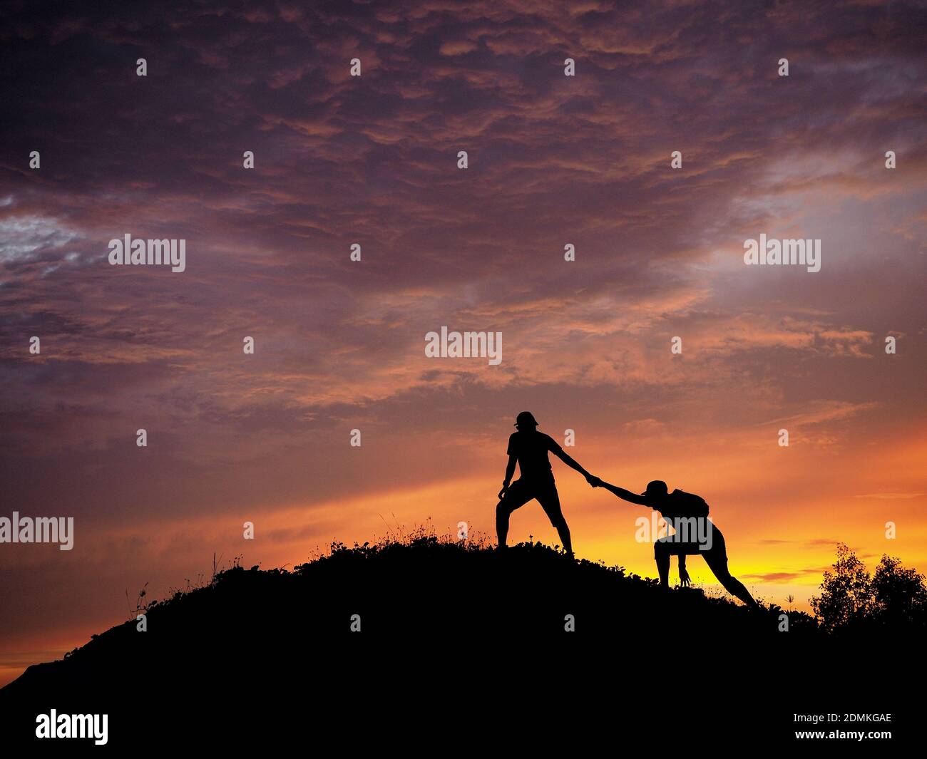 Helping hands mountain climbing hi-res stock photography and images - Alamy