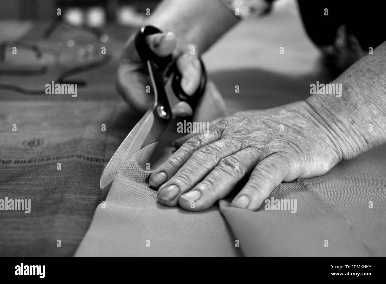 Hand fabric cutting Black and White Stock Photos & Images - Alamy