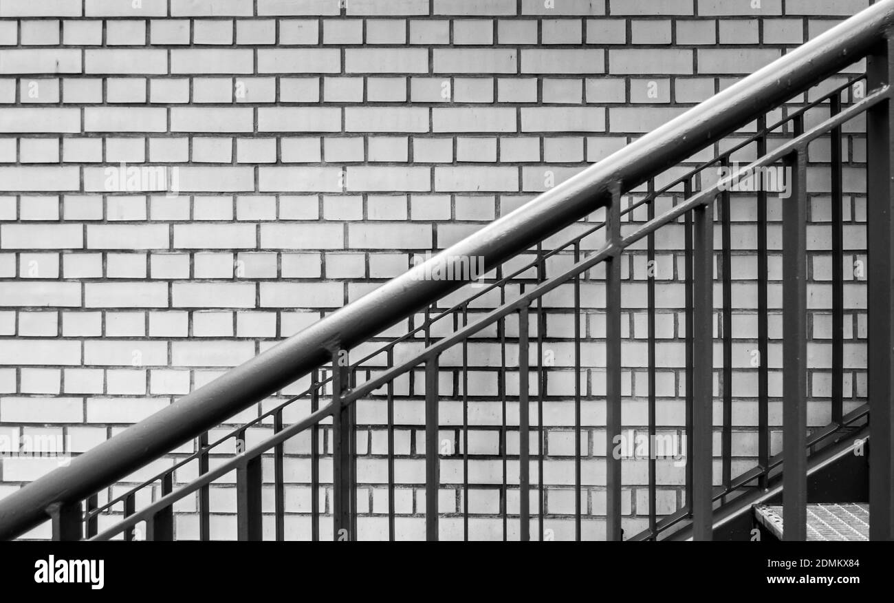 Close-up Of Stairs Against Brick Wall Stock Photo - Alamy