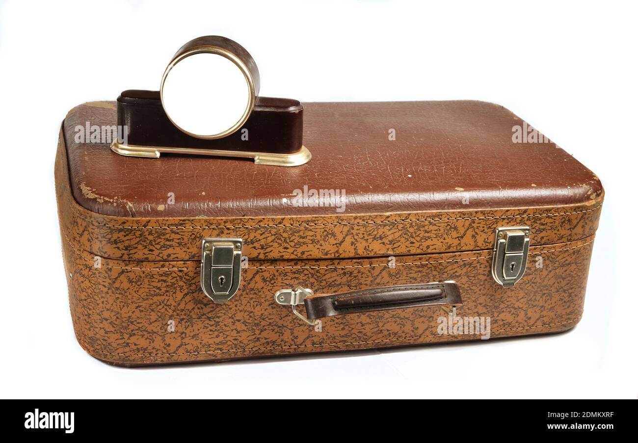 Old leather suitcase and frame isolated on white background Stock Photo ...