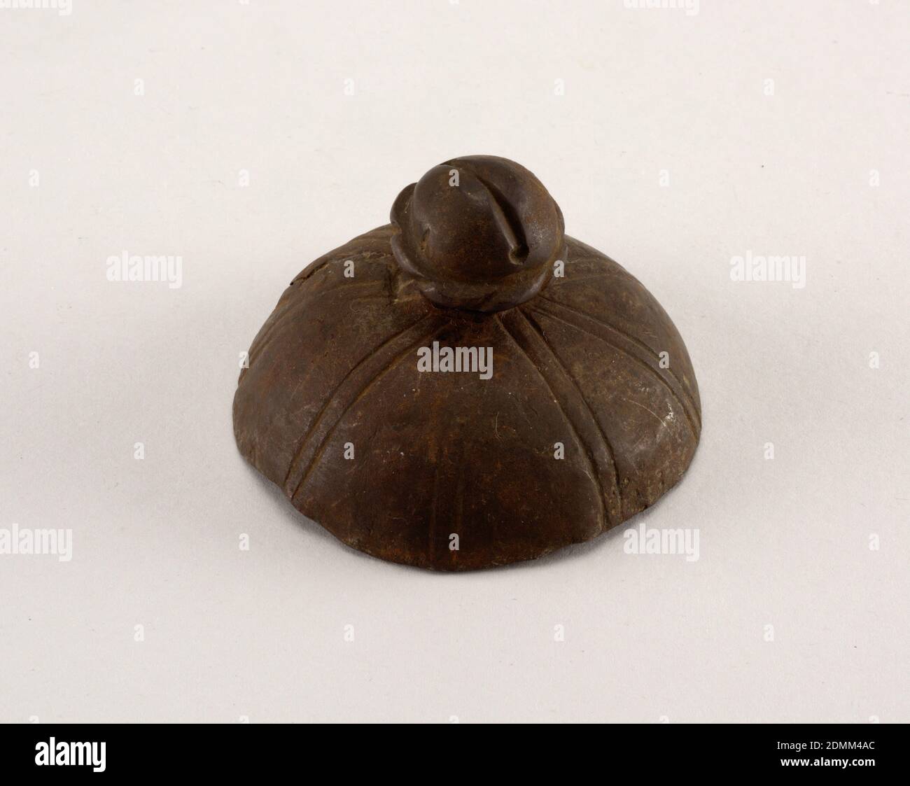 Decorative door boss and nail, Wrought iron, Hemispherical boss divided ...