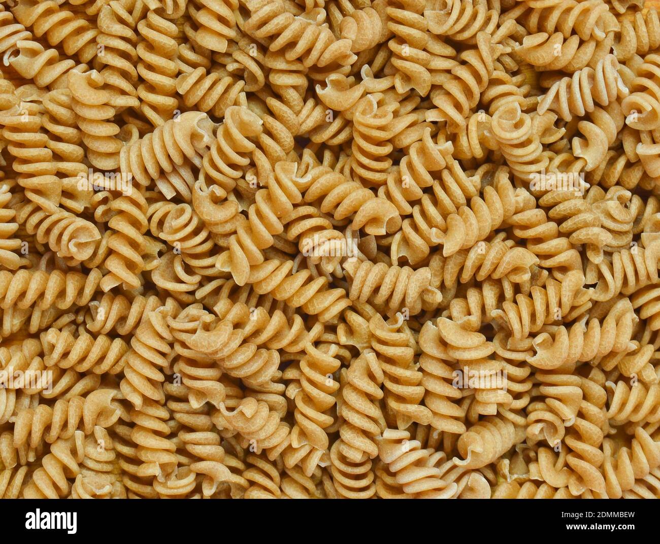 Background of wholemeal pasta Stock Photo - Alamy