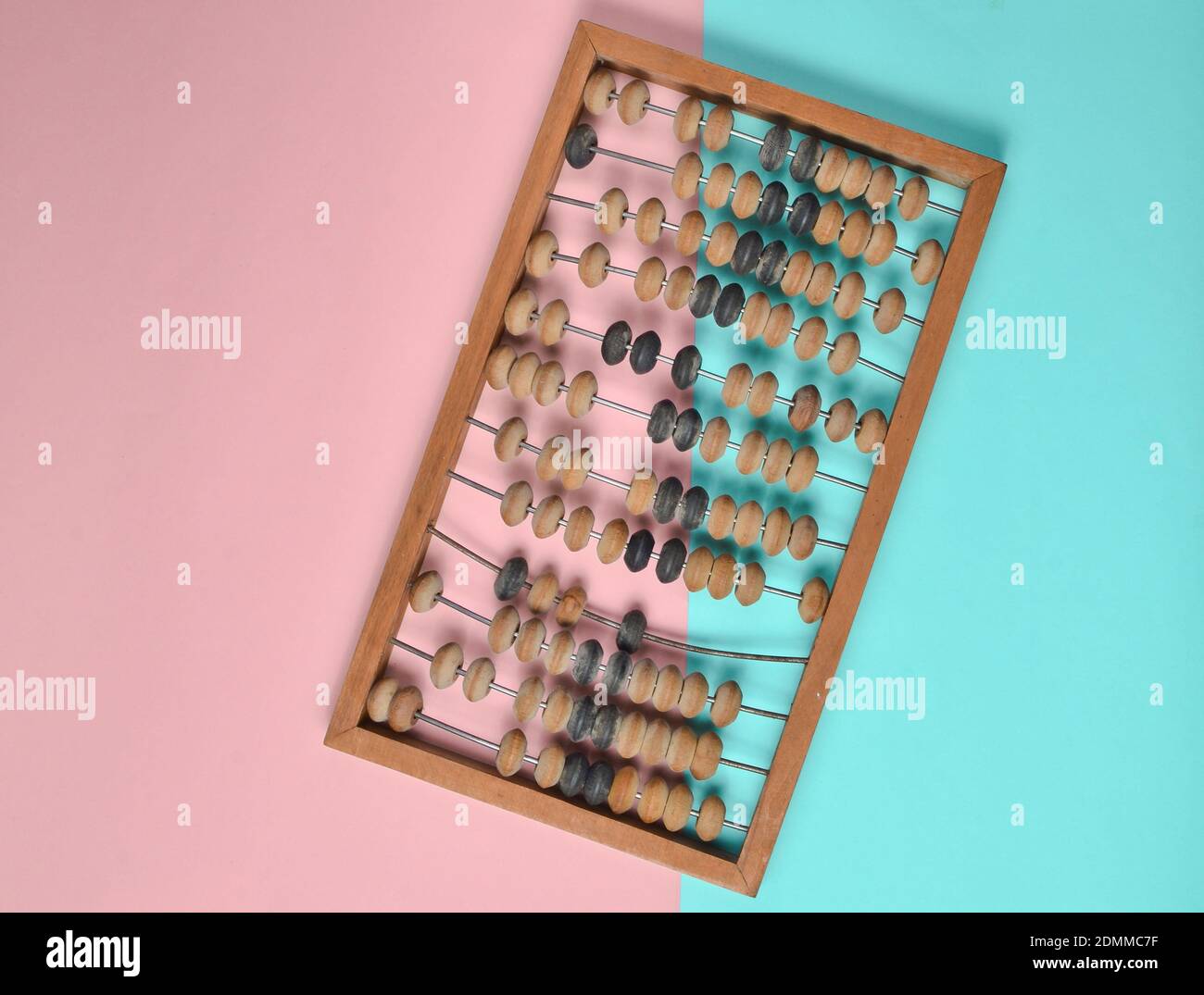 Retro wooden abacus on pastel color paper background. top view Stock ...