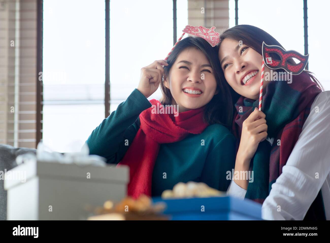 Two Females enjoy to celebrate Christmas and new year party at home in ...