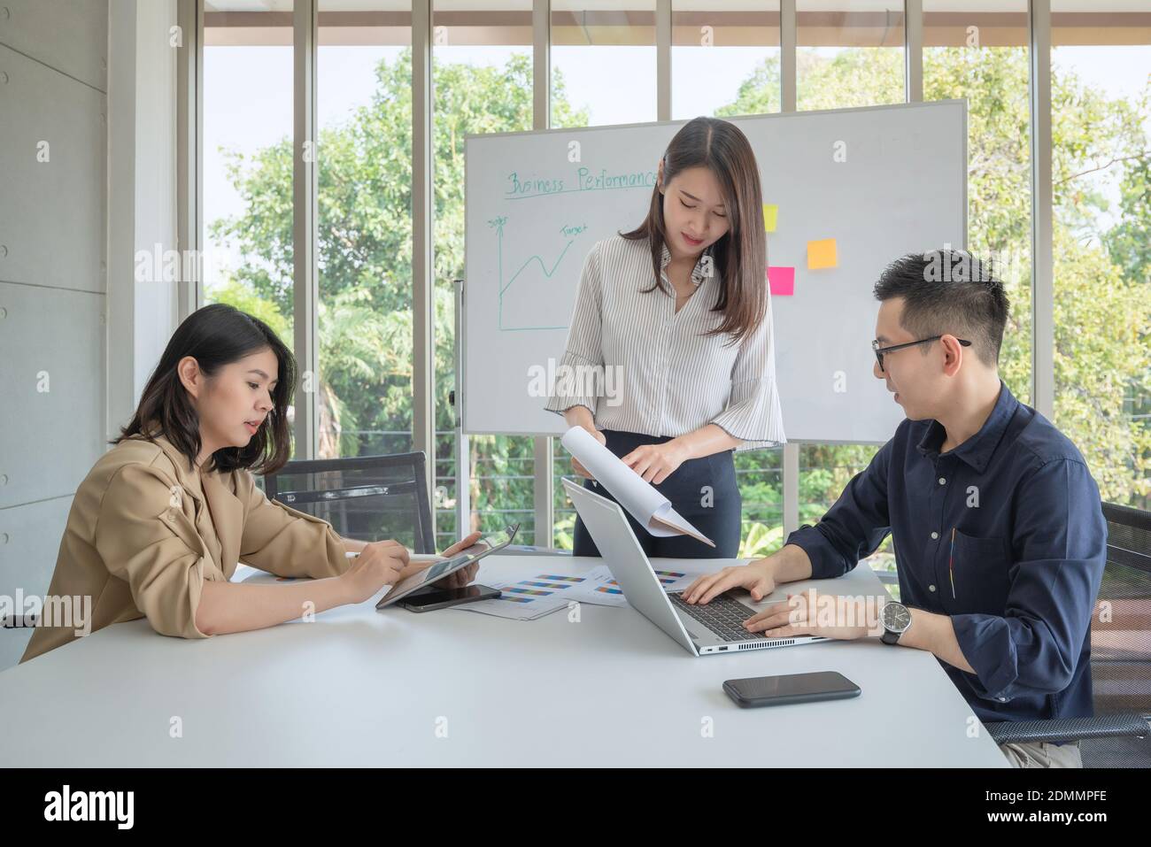 Business employees have discussion and brainstorm in meeting room at ...