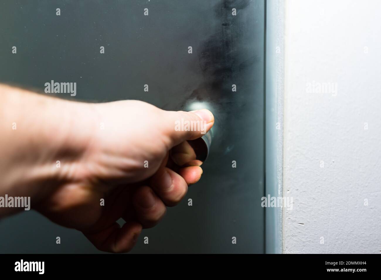 Hand Touching Metal Door High Resolution Stock Photography and Images ...