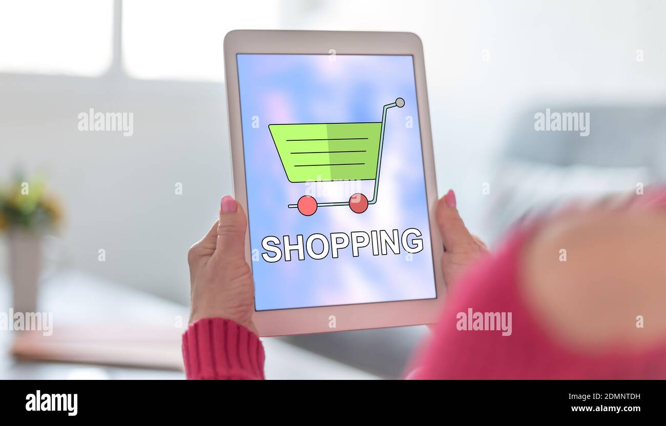 Tablet screen displaying a shopping concept Stock Photo - Alamy