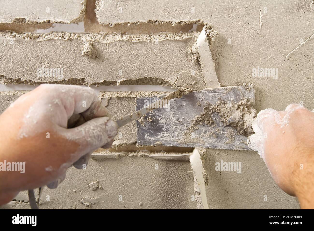 Professional Builder moulding decorative tile on wall from gips plaster ...