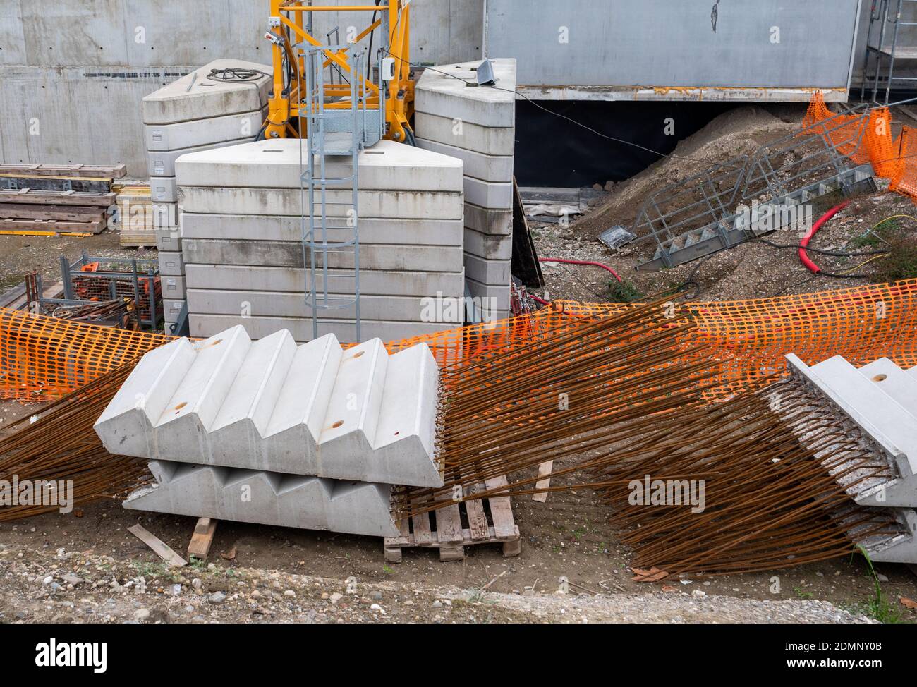Construction site with multiple steel elements concrete plaques and ...