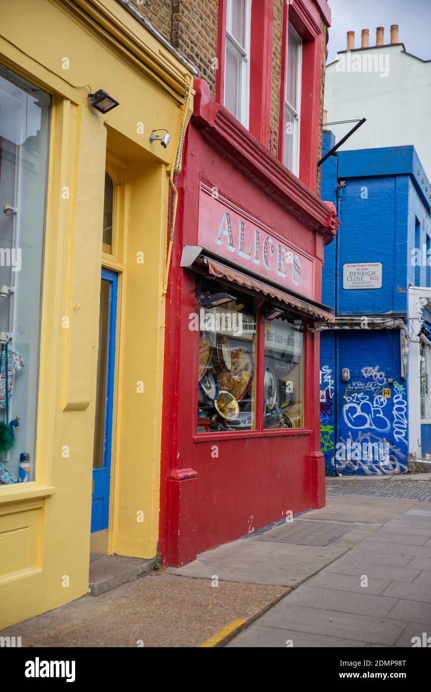 Colorful British antique shops on a street corner from Notting Hill ...