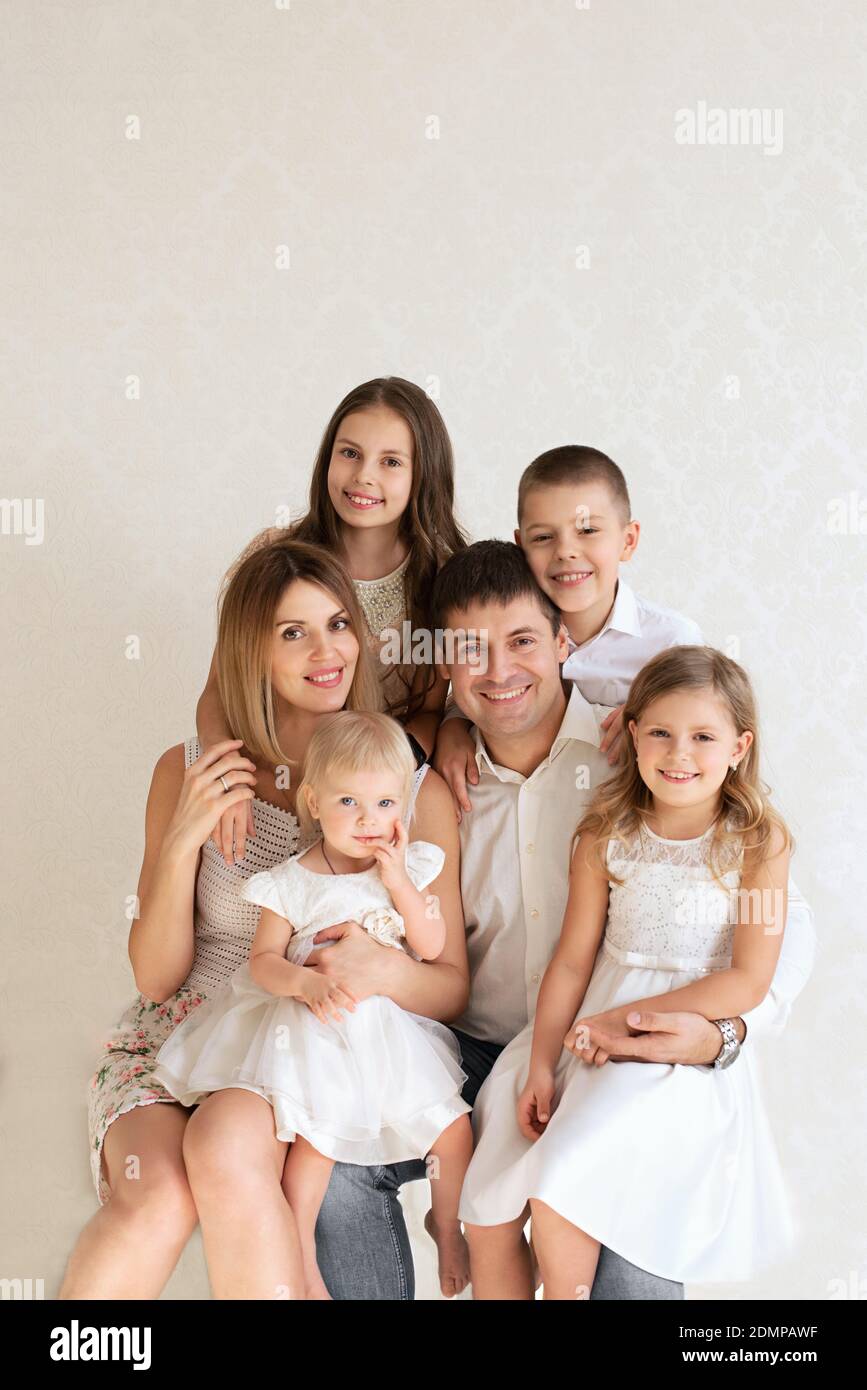 Moscow, Russia, February 15, 2020. A happy family with three children a ...