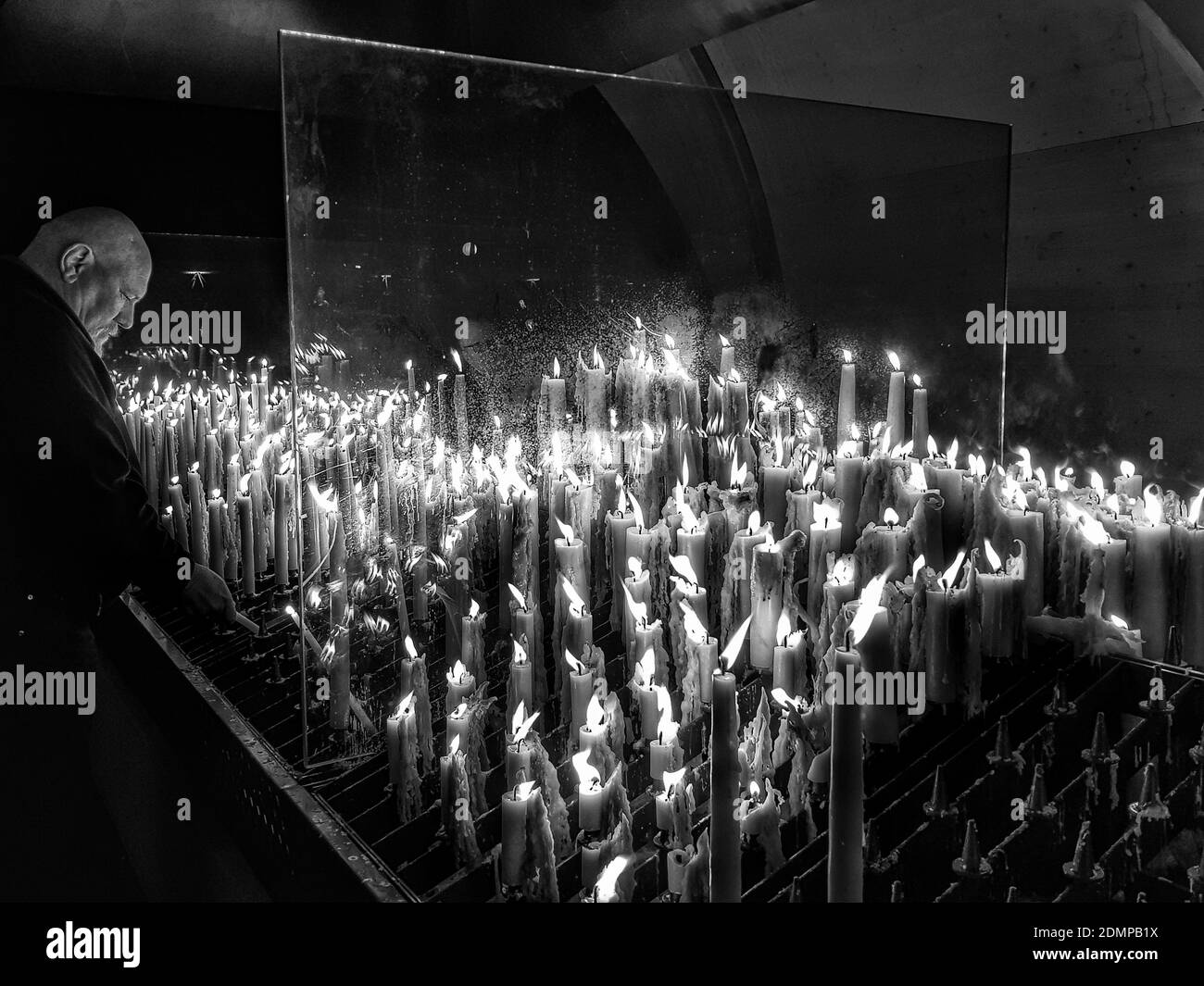 Person looking in mirror candle hi-res stock photography and images - Alamy