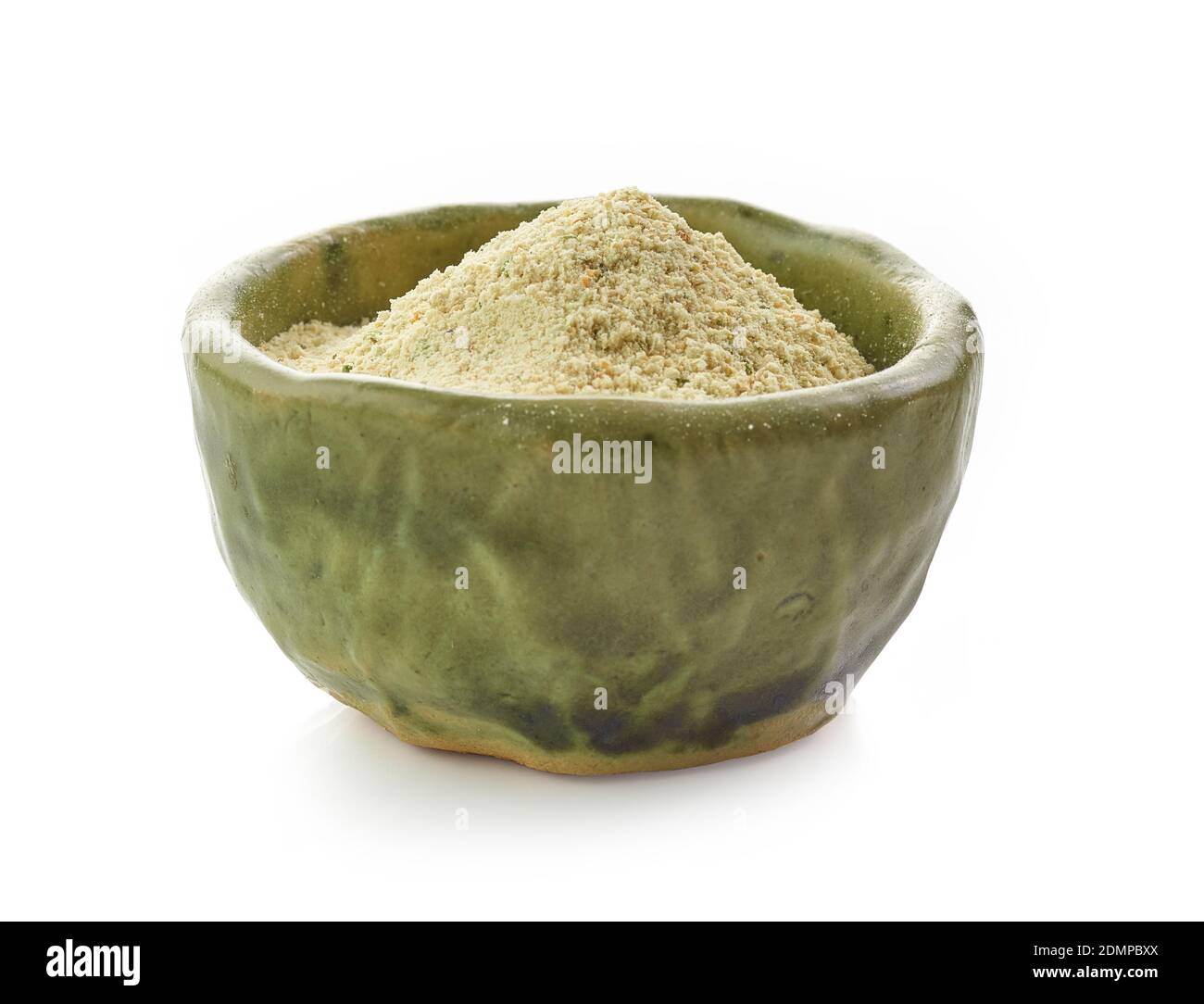 small ceramic bowl of dried plant powder isolated on white background ...
