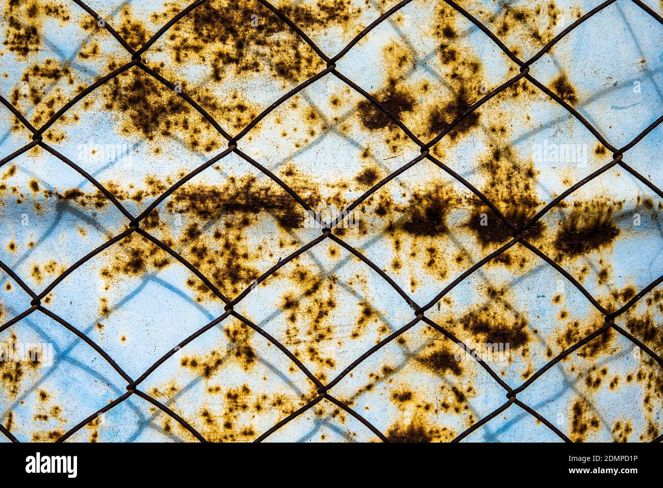 Rusty Wire Netting on the Old Metal Background Stock Photo - Alamy